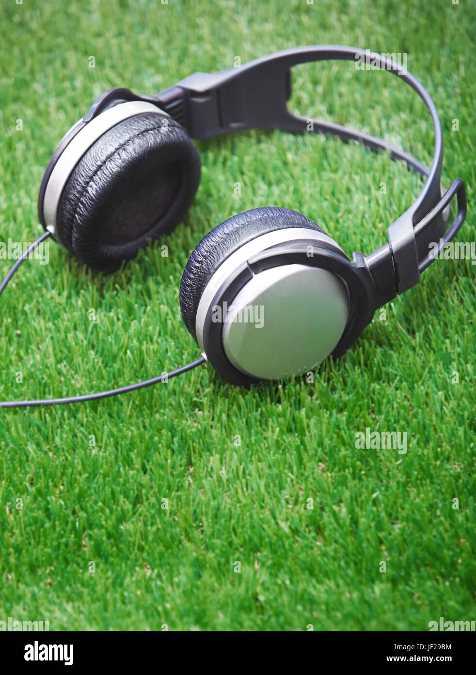Headphones in grass hi-res stock photography and images - Alamy