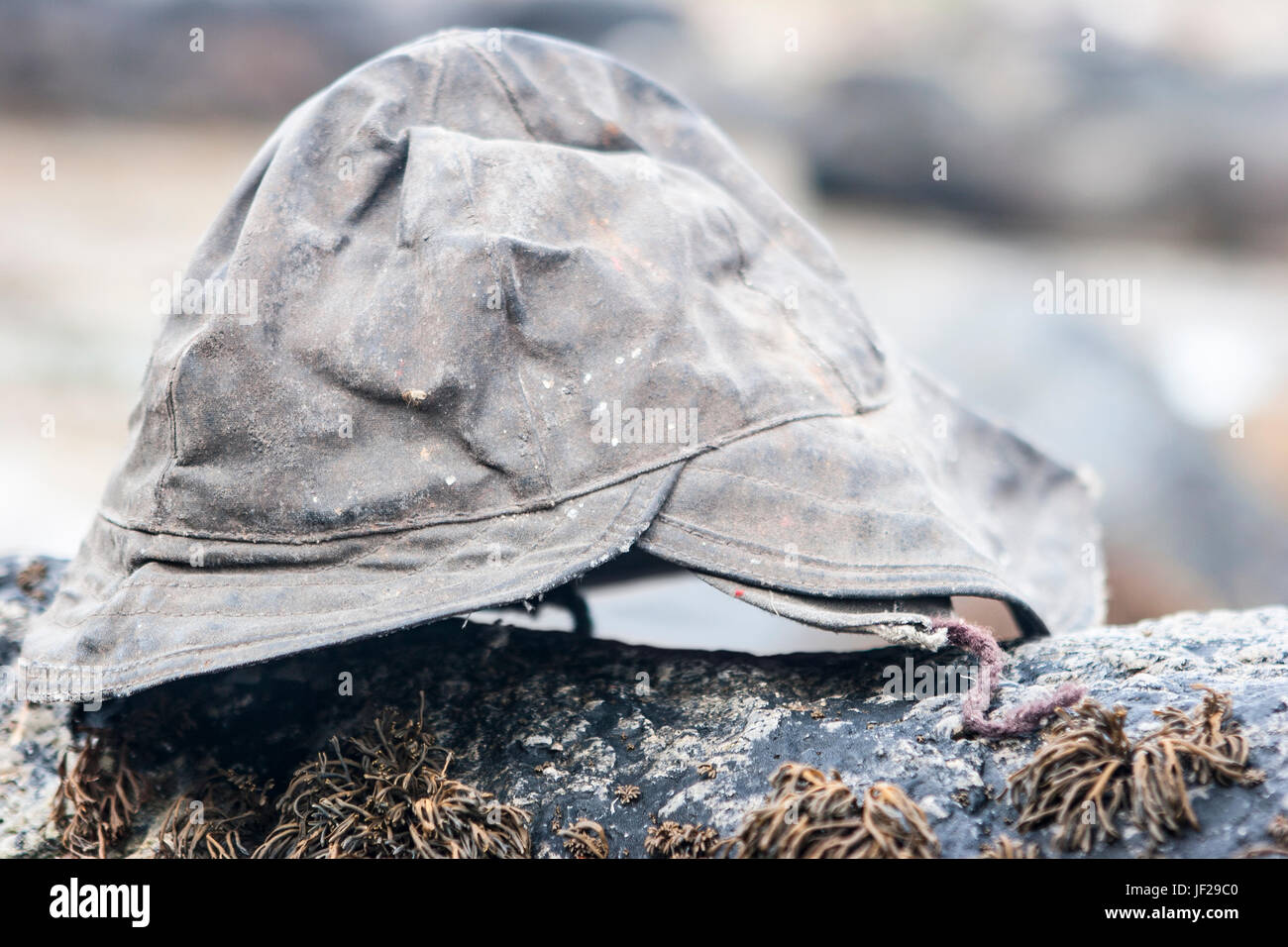 Hat on rock Stock Photo - Alamy
