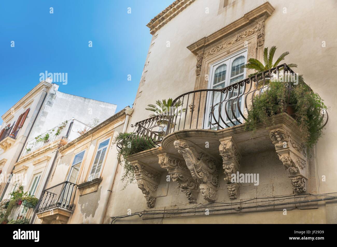 Beautiful baroque balcony Stock Photo - Alamy