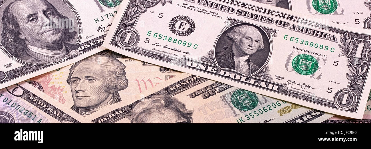 Abstract dollar bills of different denominations background Stock Photo ...