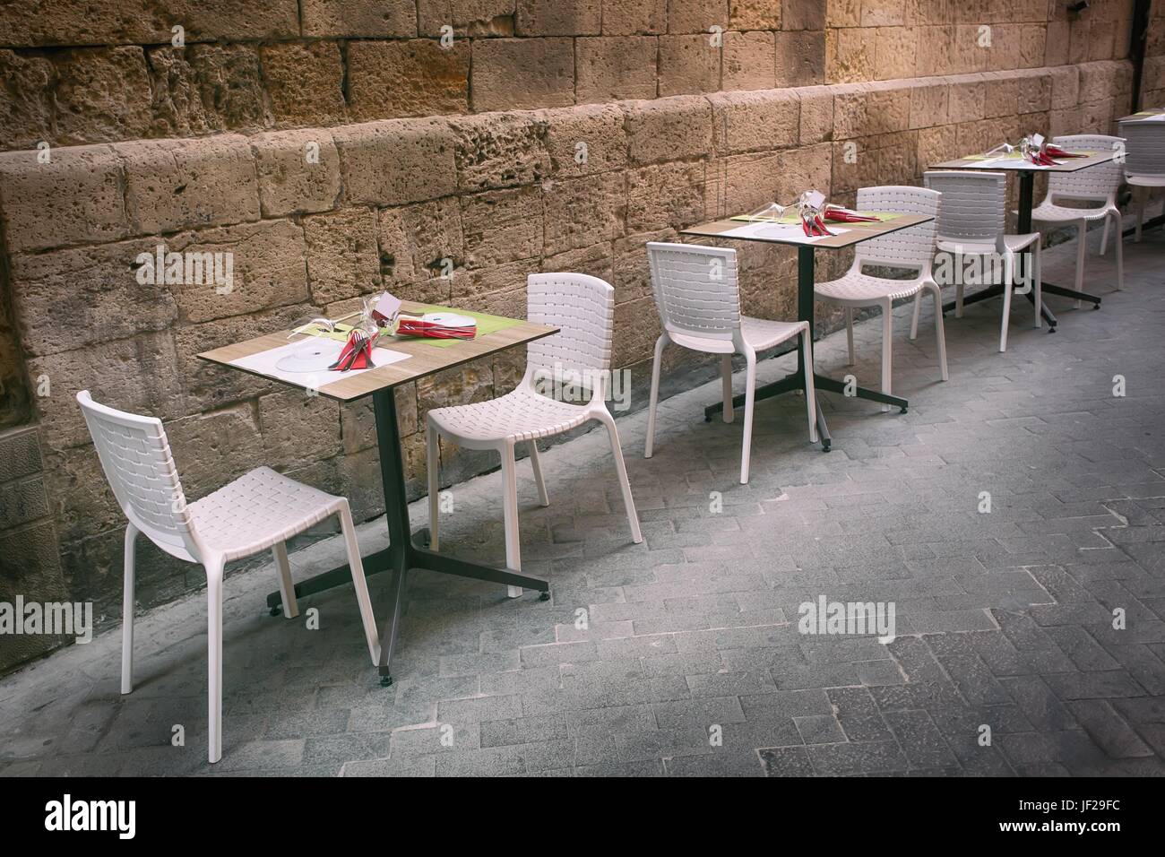 Outdoor restaurant in old european town Stock Photo - Alamy