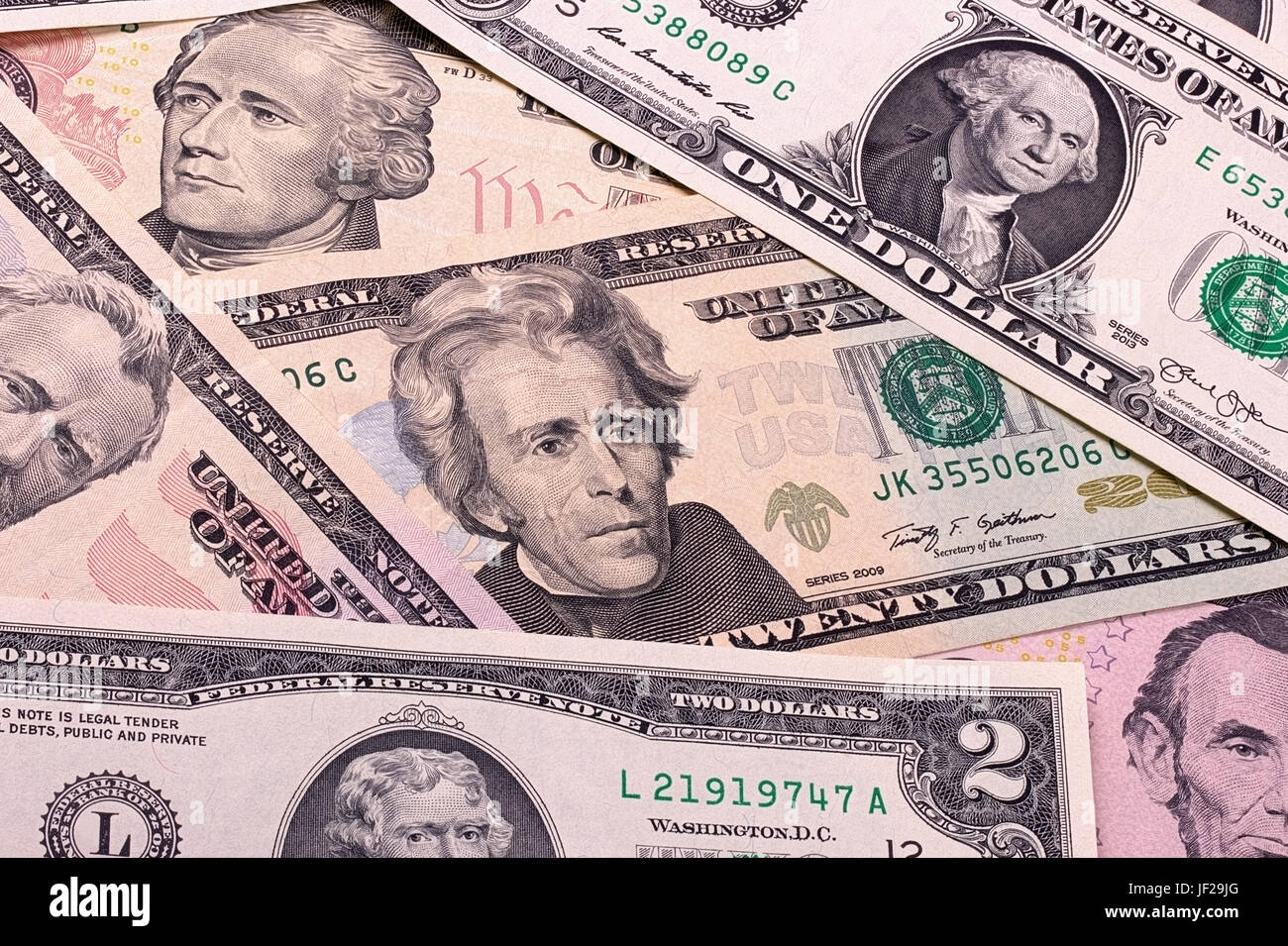 Abstract dollar bills of different denominations background Stock Photo ...