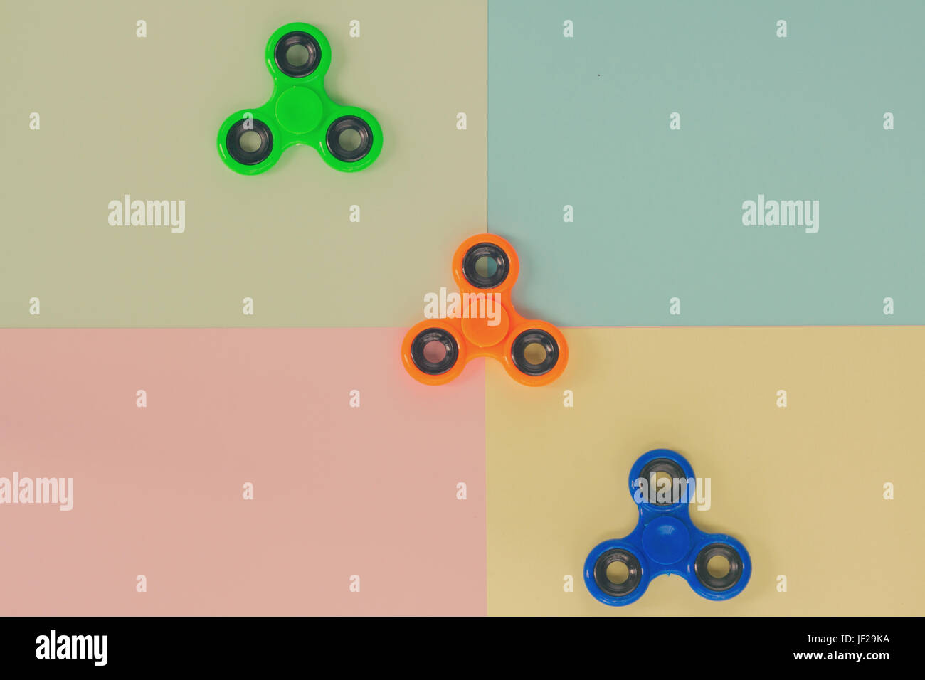 trendy fidget spinners - styled flat lay scene with set of generic ...