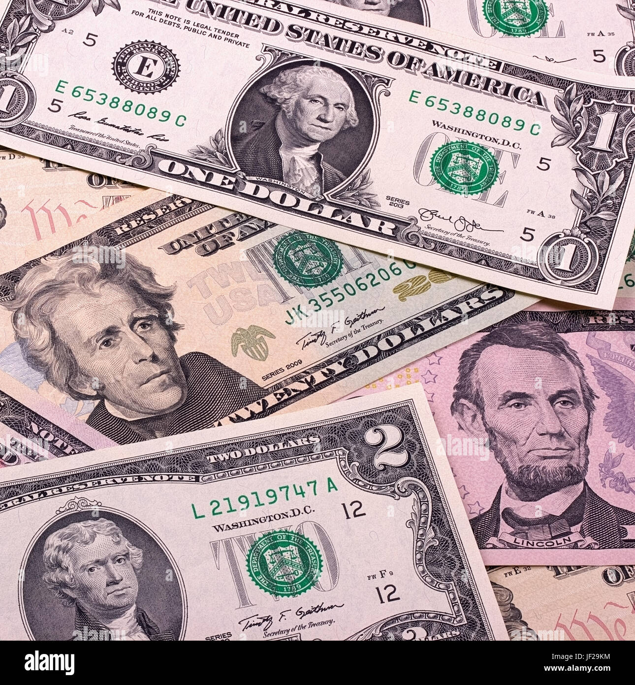 Abstract dollar bills of different denominations background Stock Photo ...