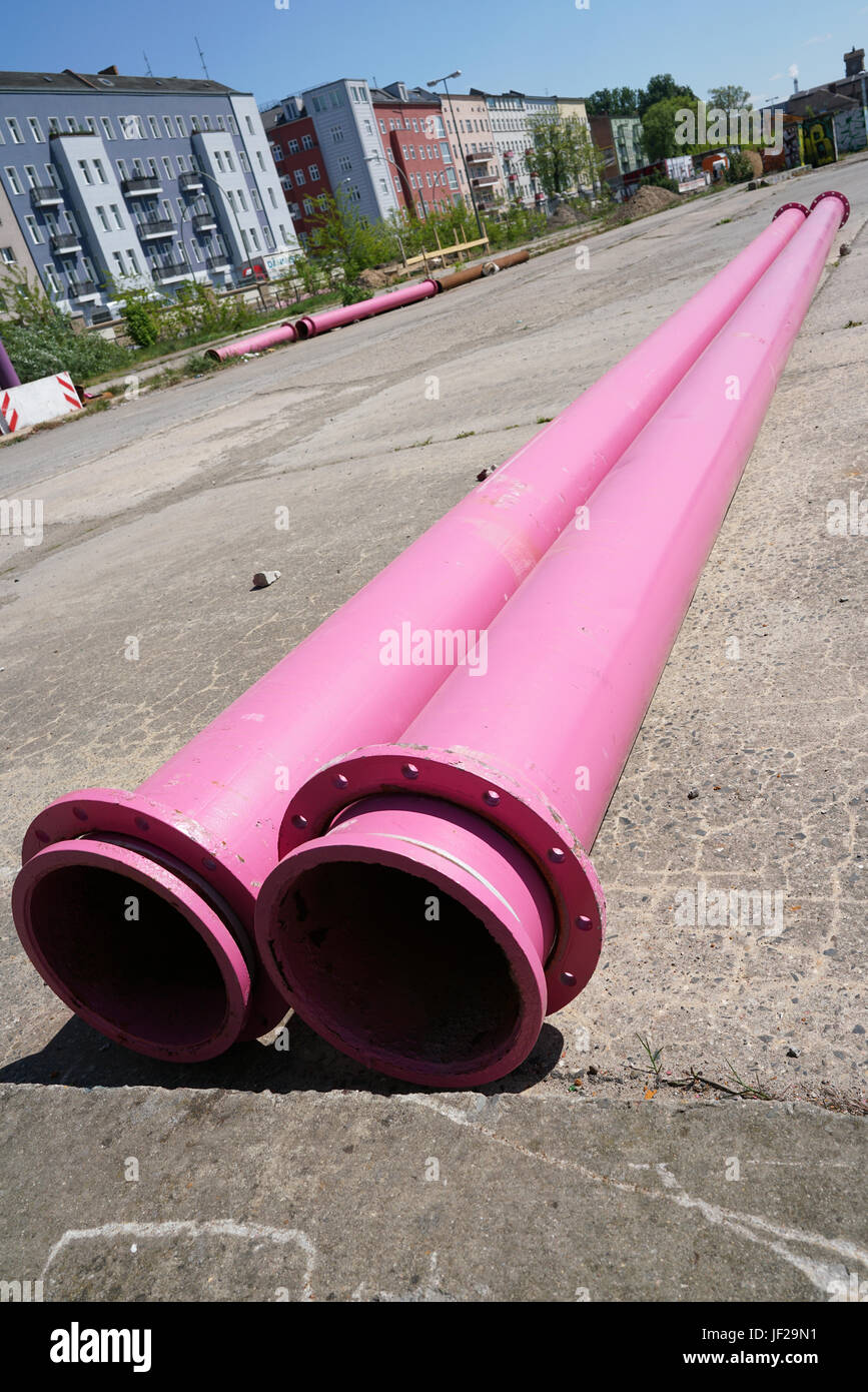 Pipes in a parking lot in Berlin Stock Photo - Alamy