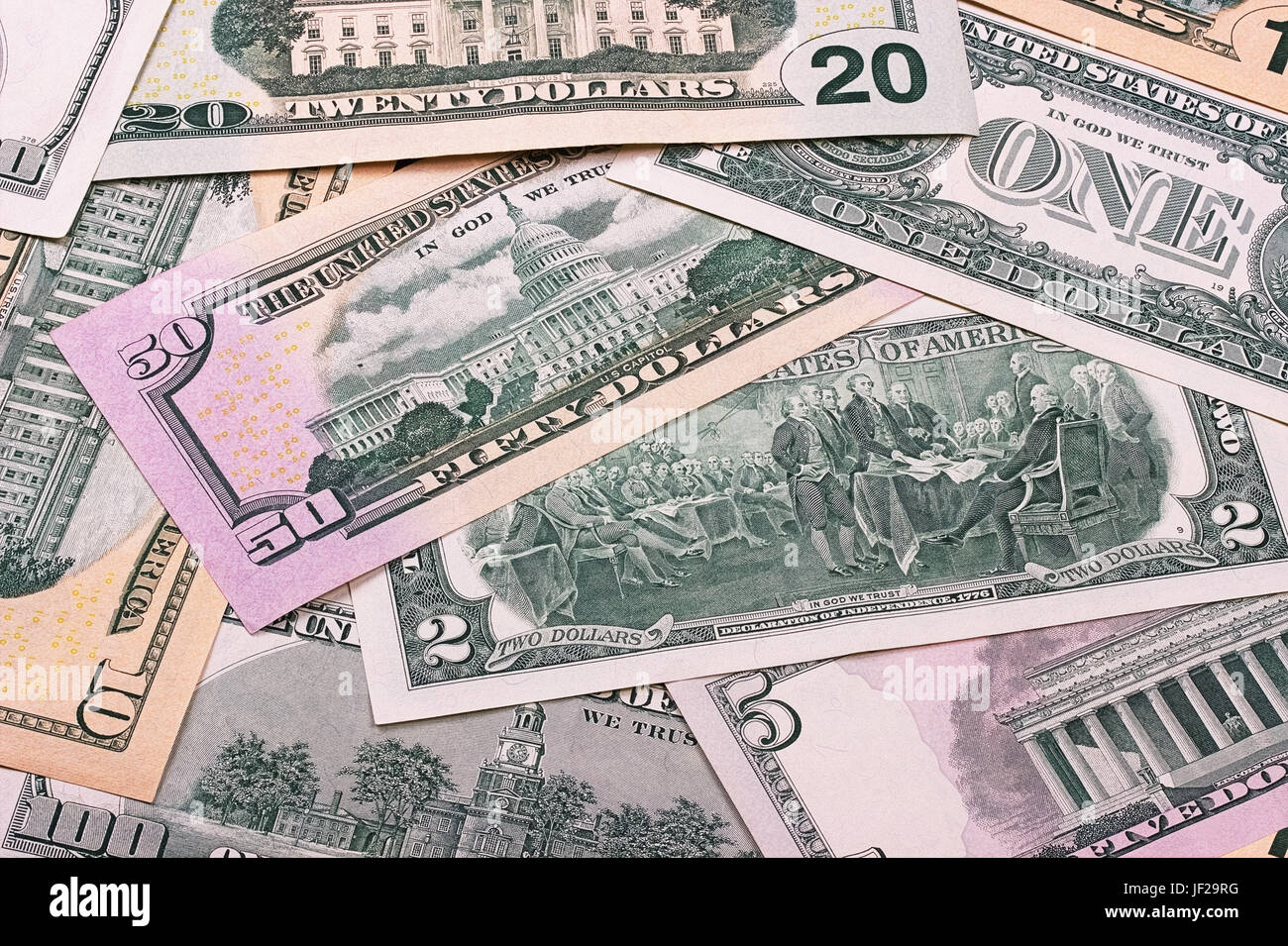 Abstract dollar bills of different denominations background Stock Photo ...