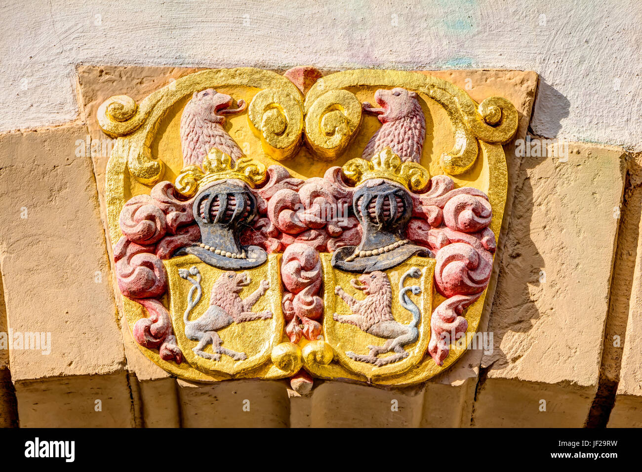 Historic emblem at a building Stock Photo - Alamy