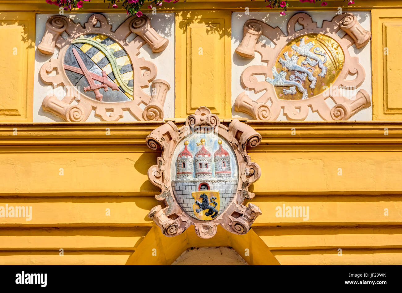 Historic emblem at a building Stock Photo - Alamy