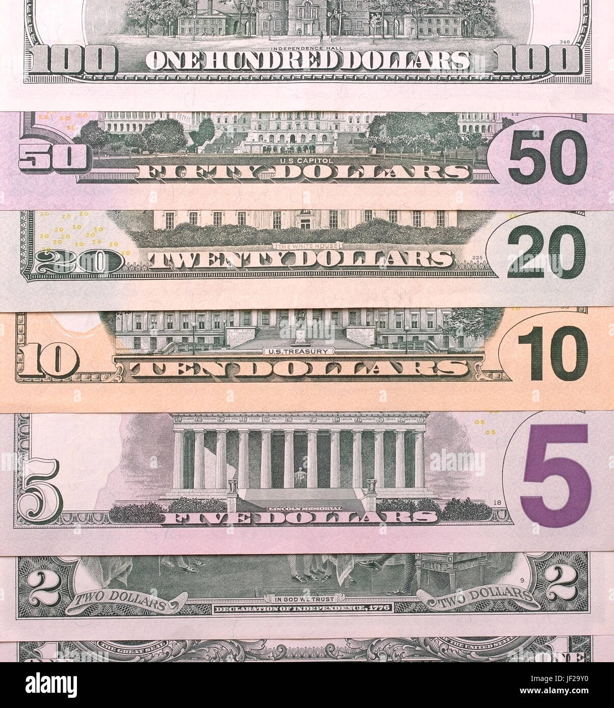 Abstract dollar bills of different denominations background Stock Photo ...