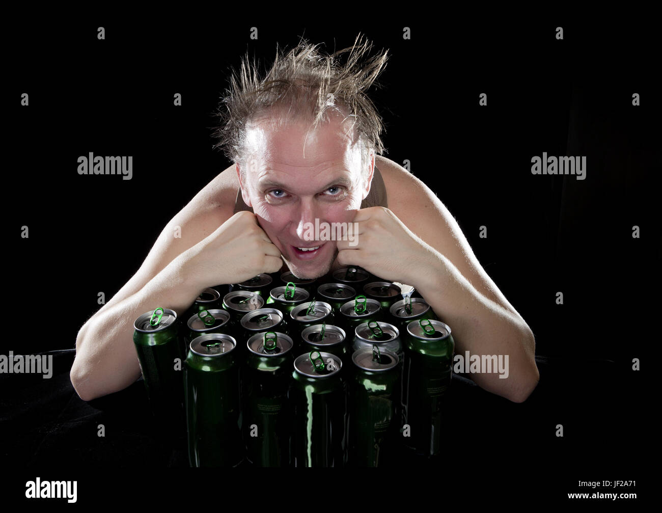 The happy tipsy man near empty beer jars Stock Photo - Alamy