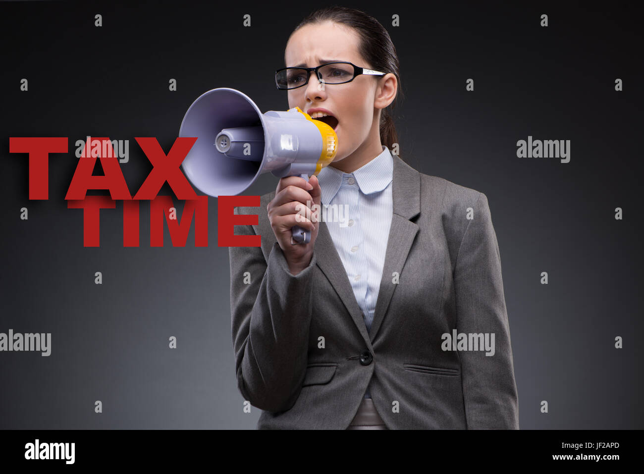 Businesswoman in business tax concept Stock Photo - Alamy