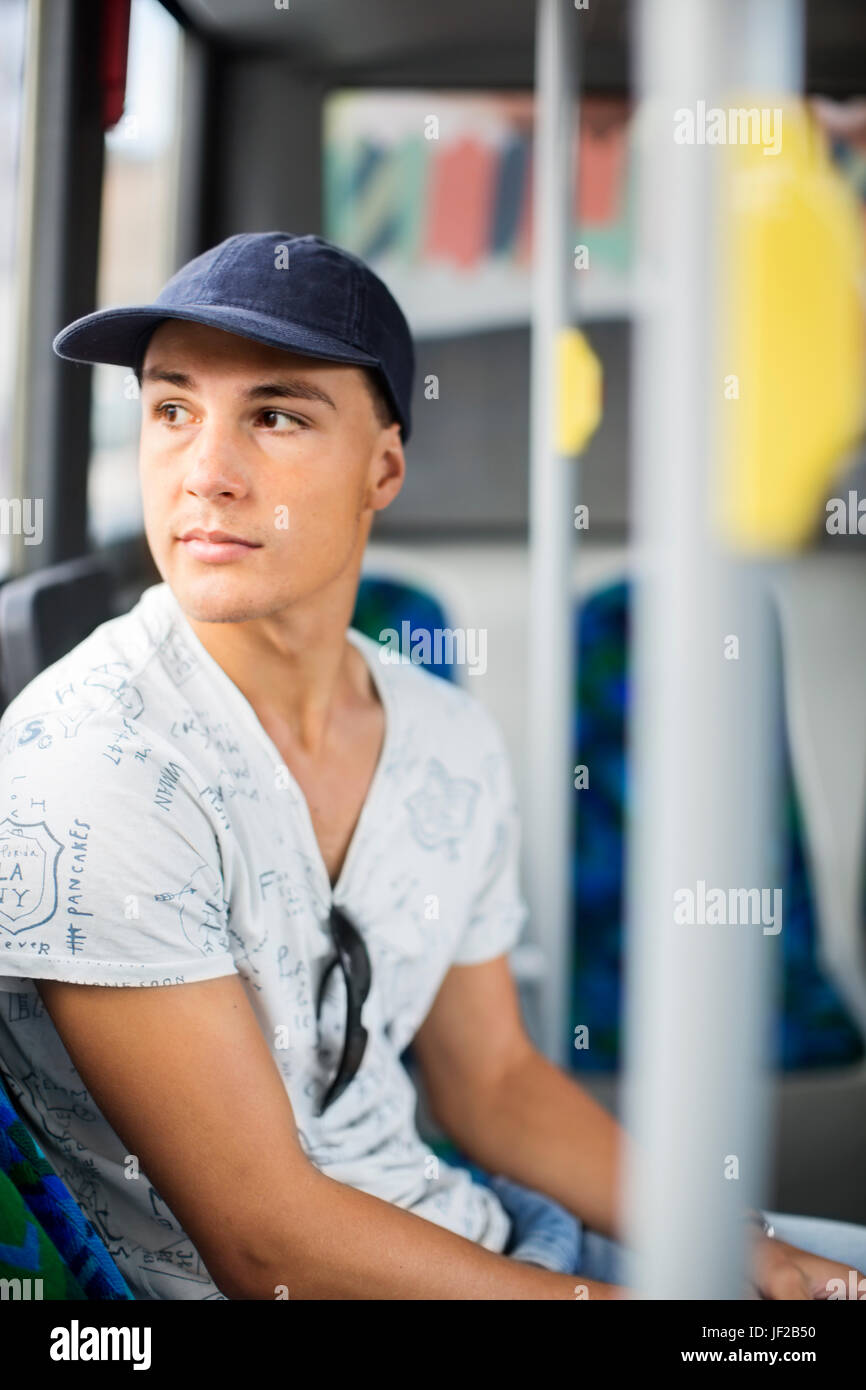 Boy looking out bus window hi-res stock photography and images - Alamy