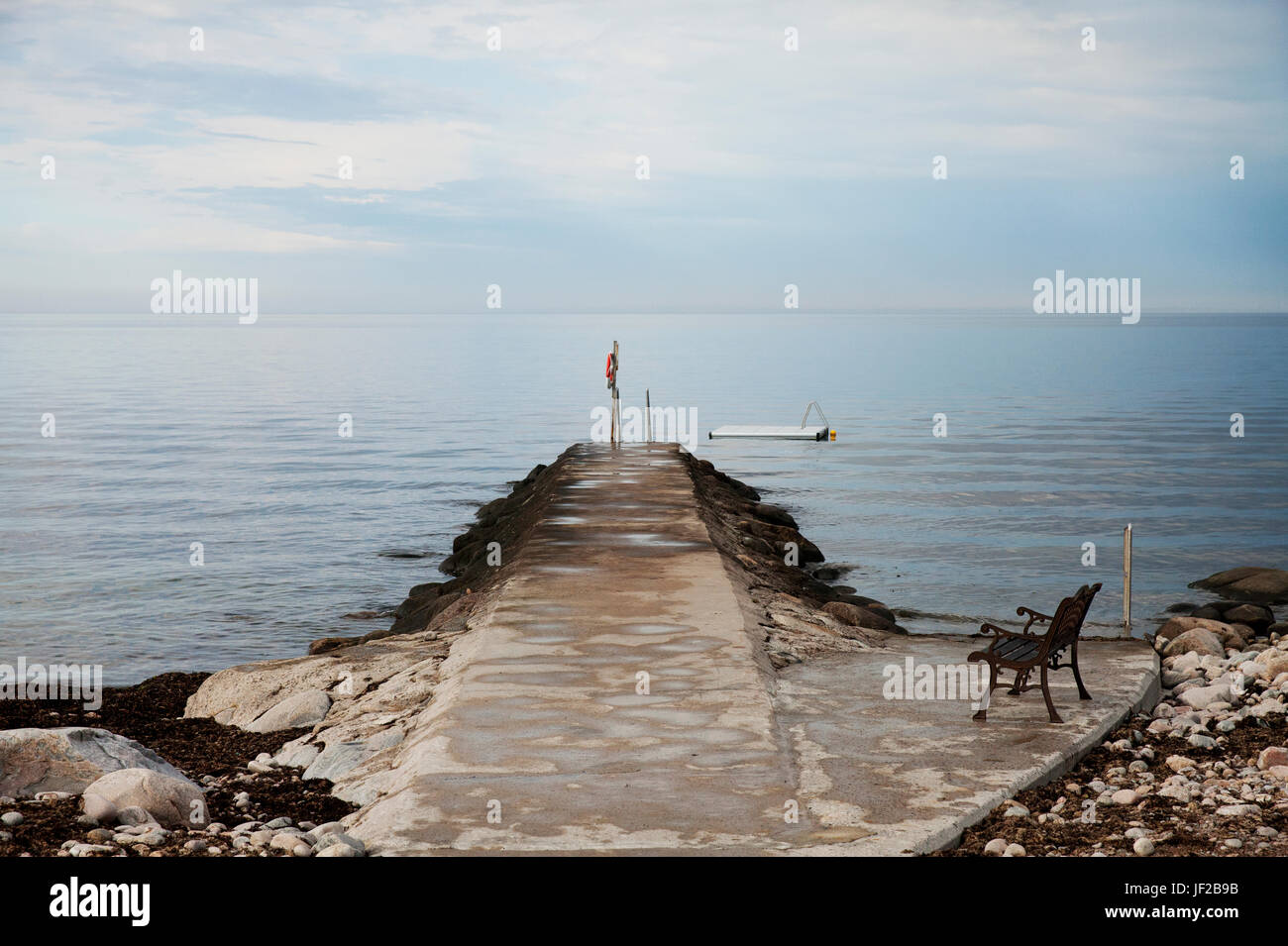 Empty jetty at sea Stock Photo - Alamy