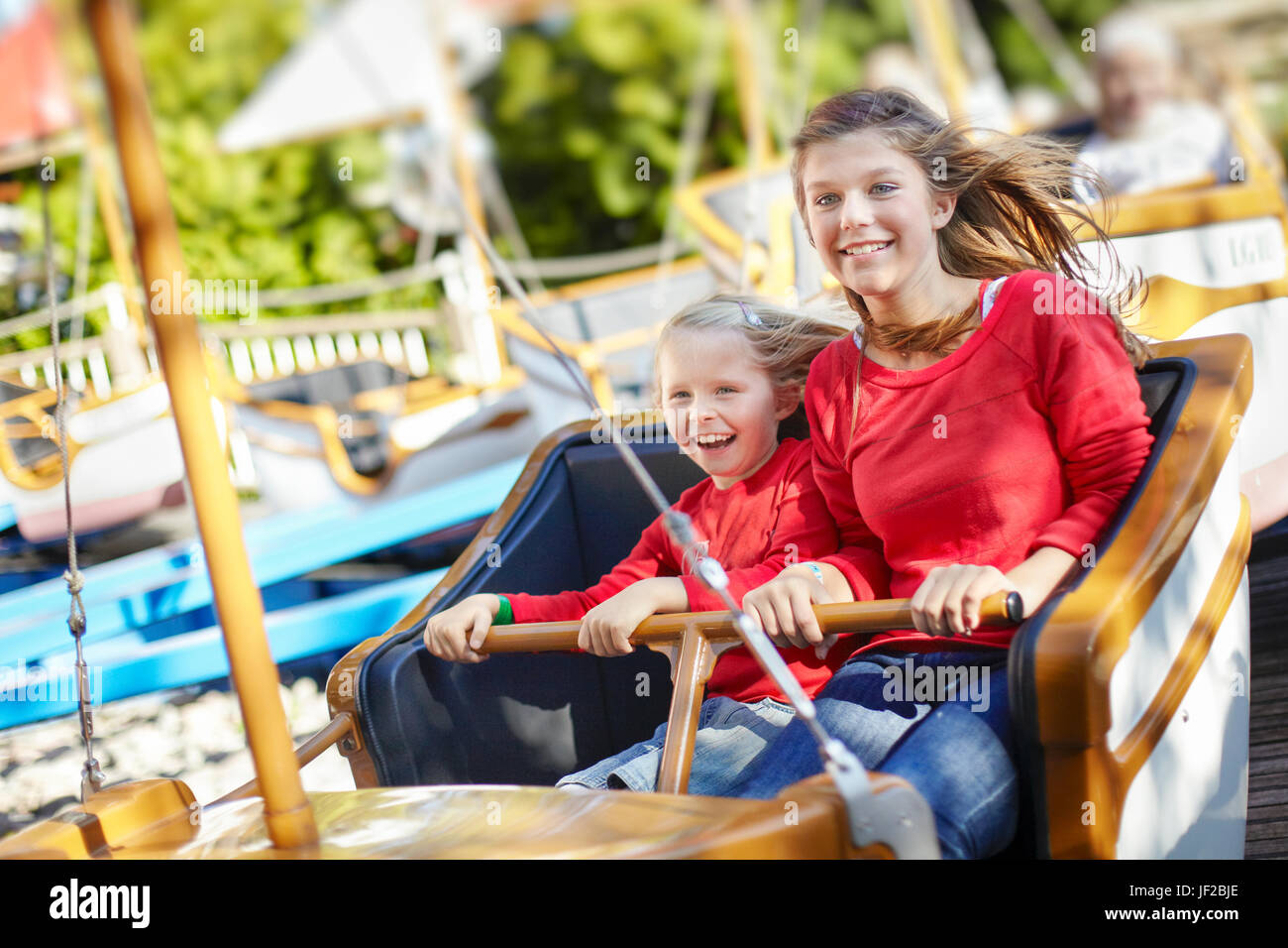 Girls on fairground Stock Photo - Alamy
