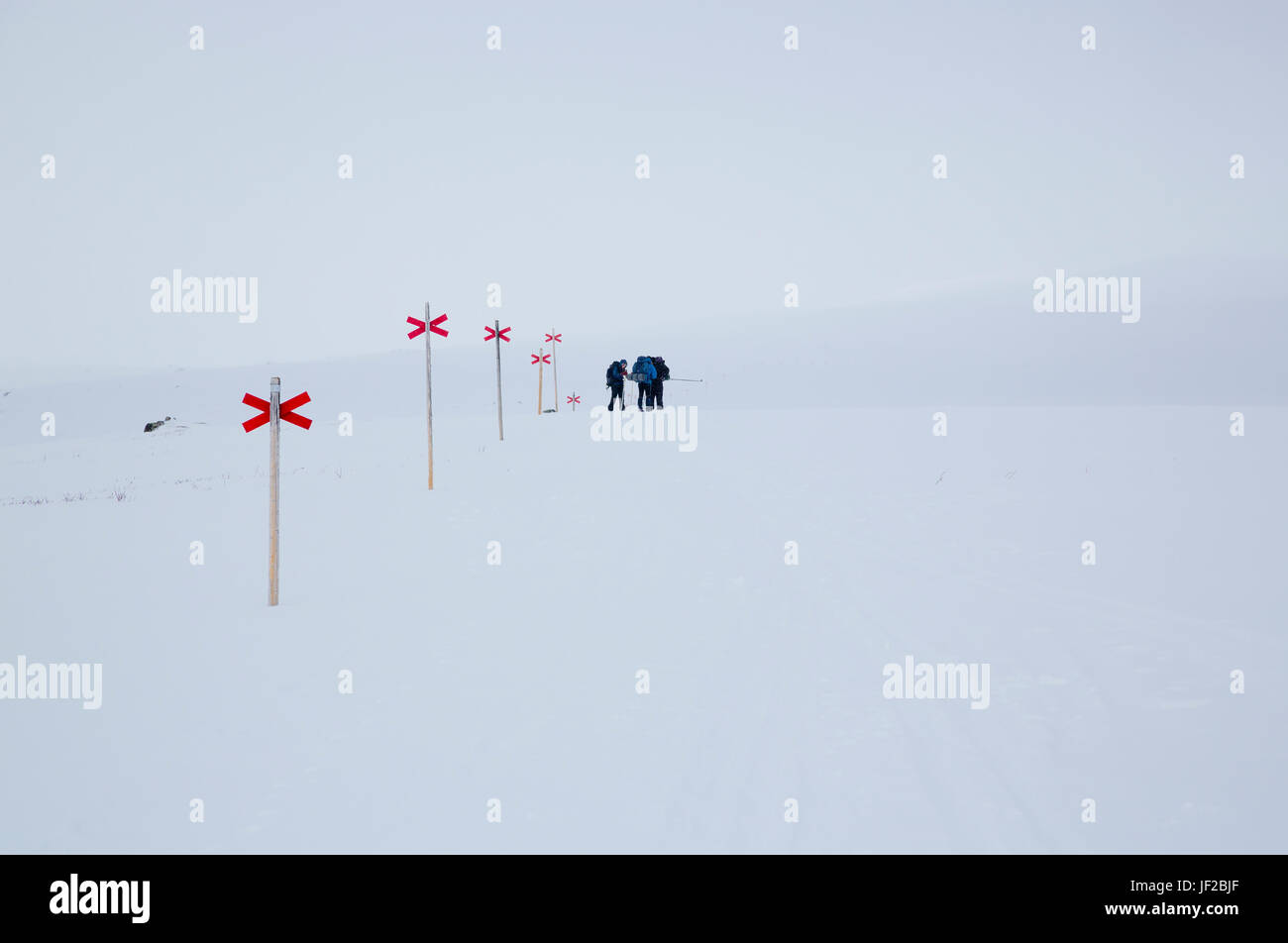 Winter landscape with trail markings Stock Photo - Alamy