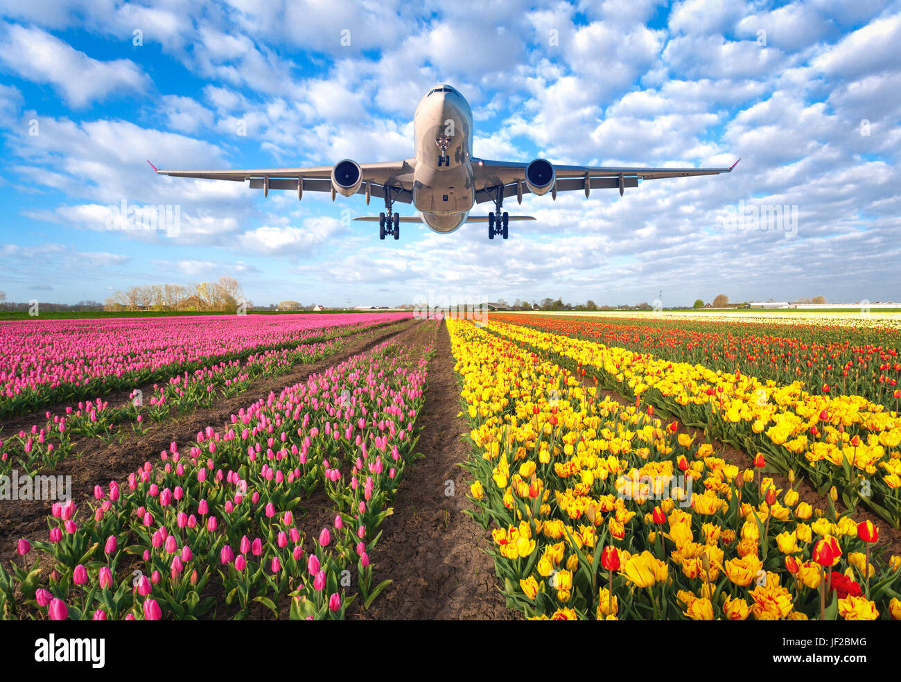 Airplane. Landscape with passenger airplane is flying in the blue sky ...