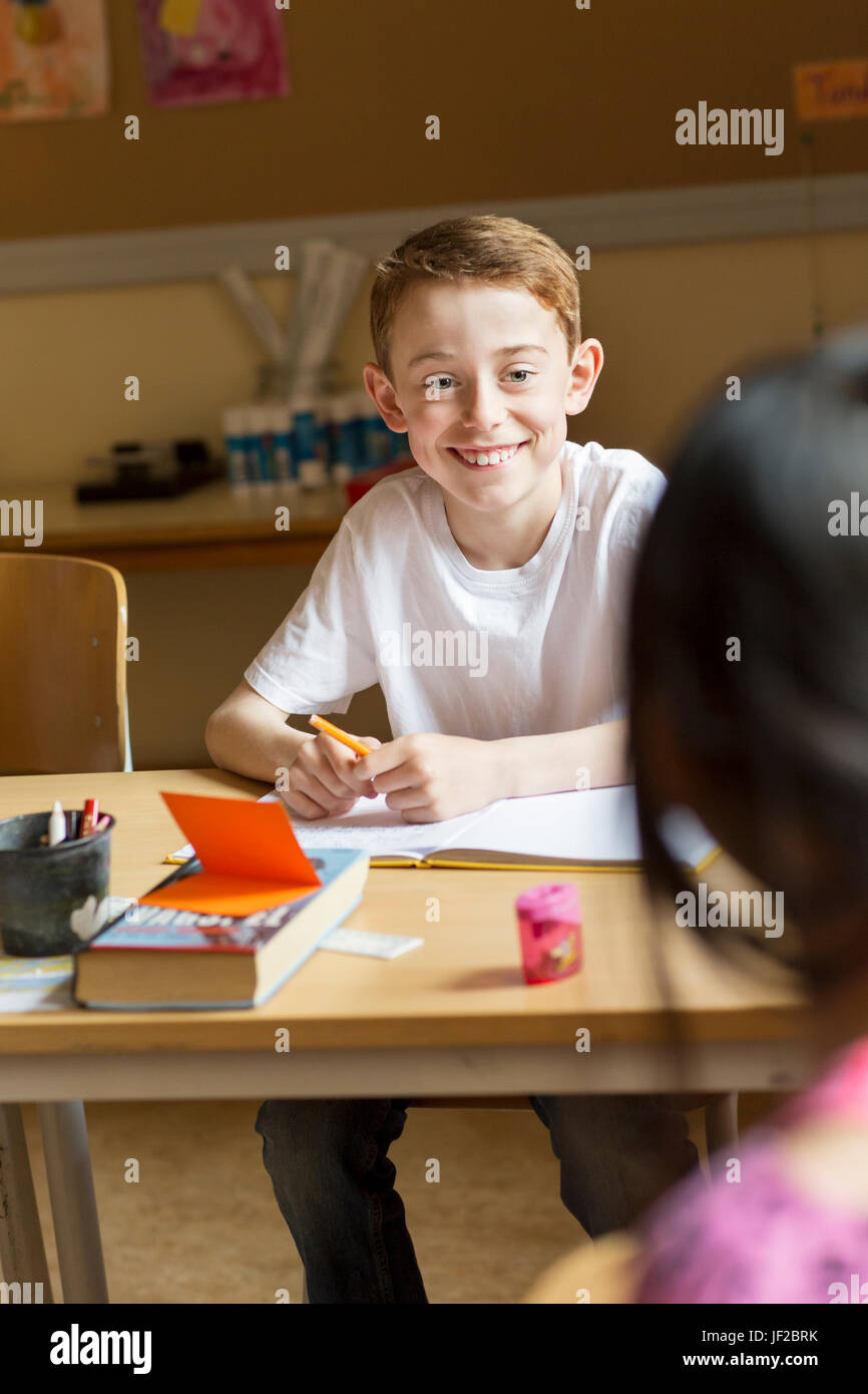 Boy in classroom Stock Photo - Alamy