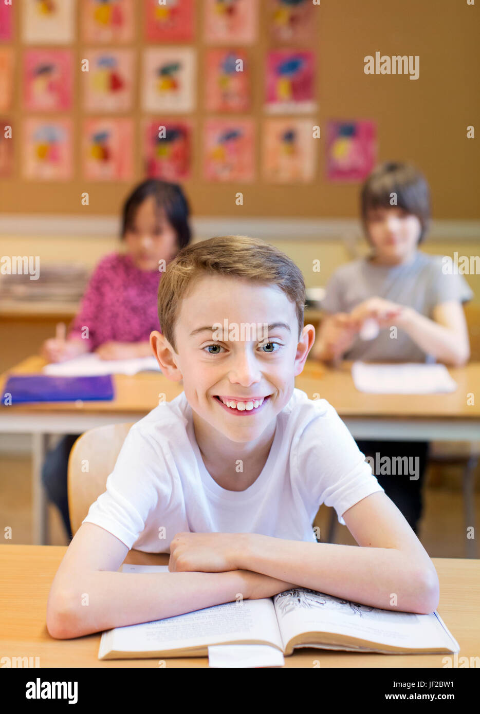 Boy in classroom Stock Photo - Alamy