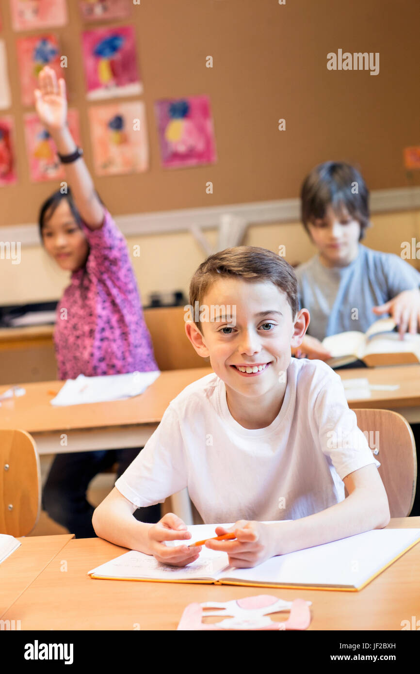 Boy in classroom Stock Photo - Alamy