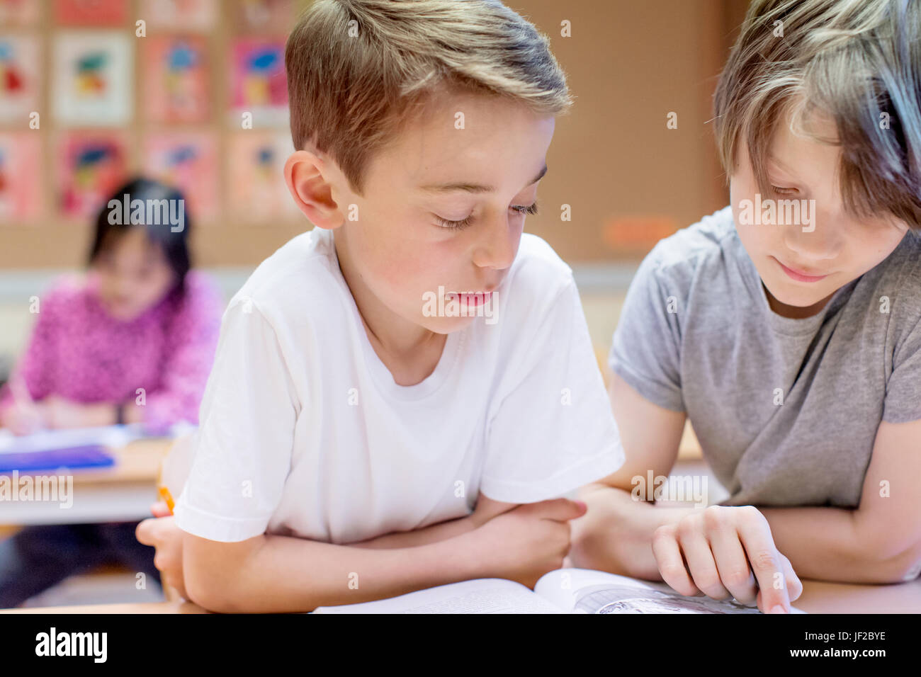 Boys in classroom Stock Photo - Alamy