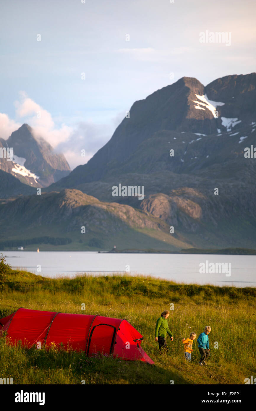 Mother with children camping Stock Photo - Alamy