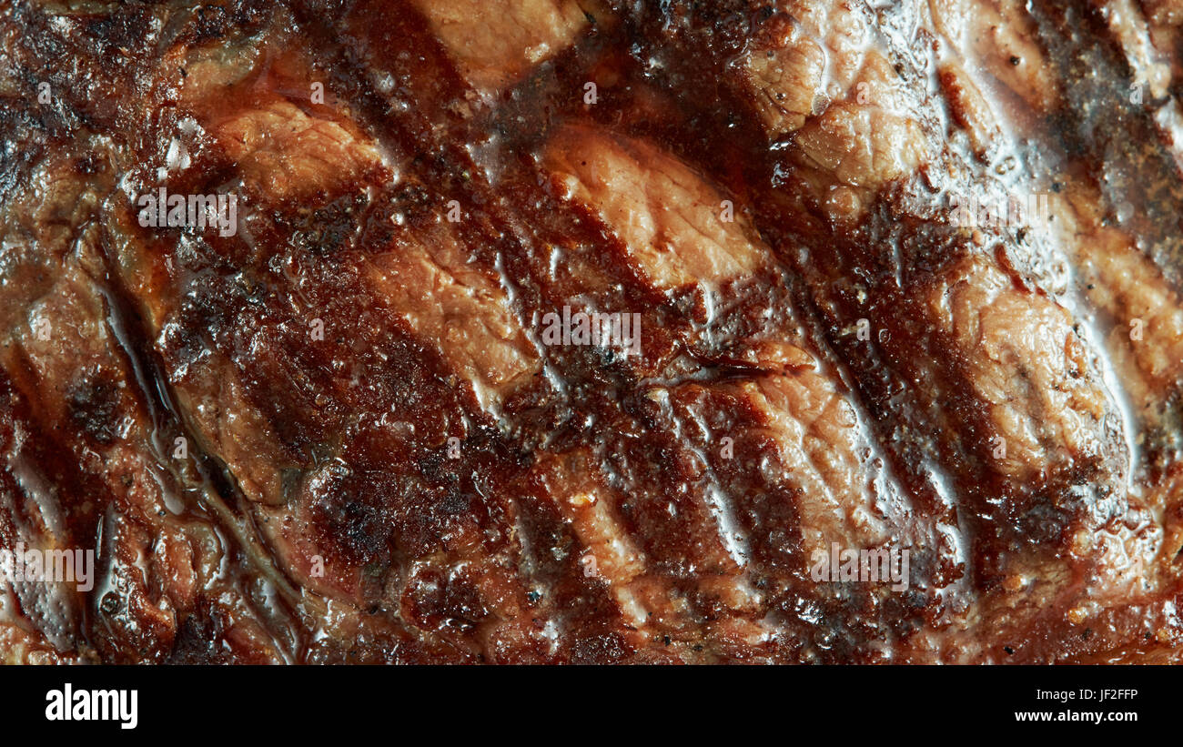 Macro of grilled meat Stock Photo - Alamy
