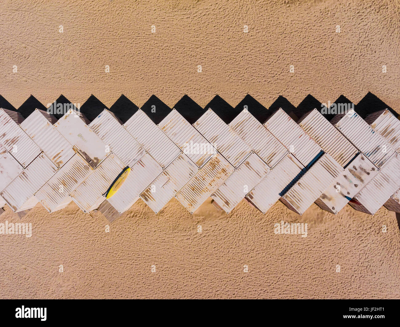 Top view aerial photo of freight containers in rows on beach. Cargo ...