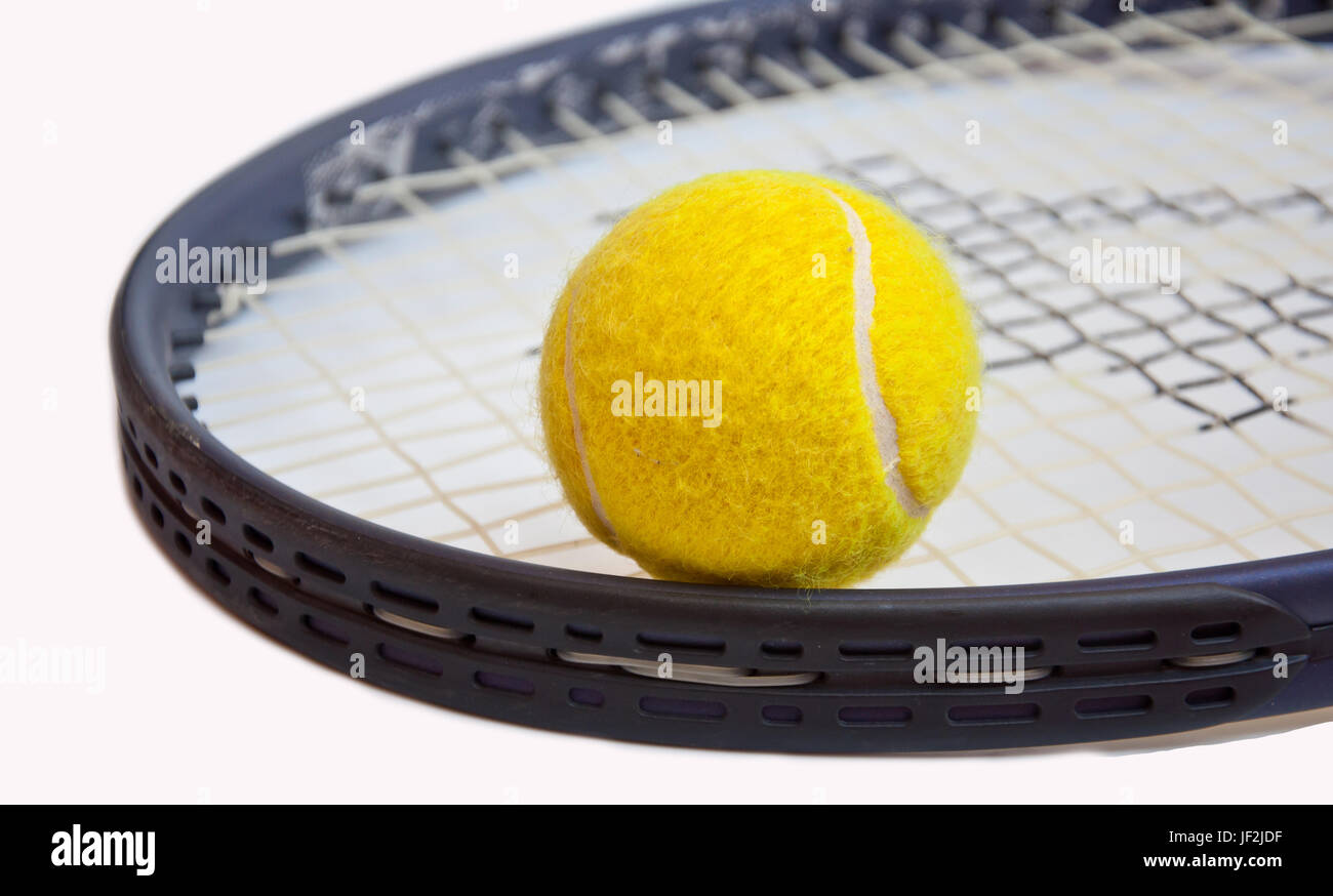 tennis ball on racket on white background Stock Photo - Alamy