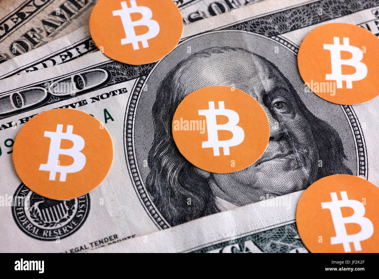 Bitcoin symbols on US dollars. Close up Stock Photo - Alamy