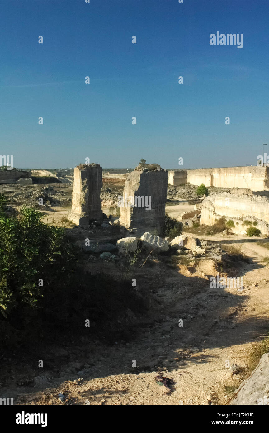 View of abandoned limestone quarry in Italy Stock Photo - Alamy