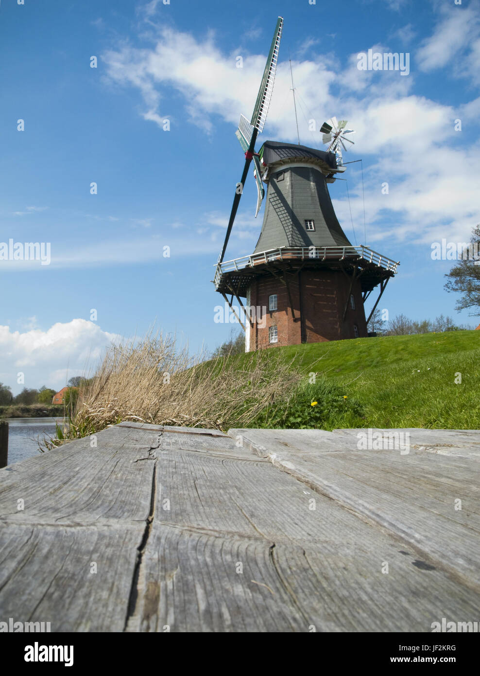 windmill by the landing stage Stock Photo - Alamy