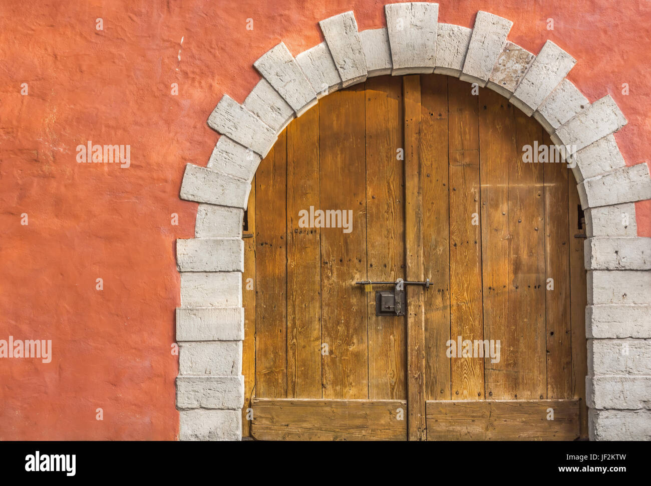 Medieval arched wooden door Stock Photo - Alamy