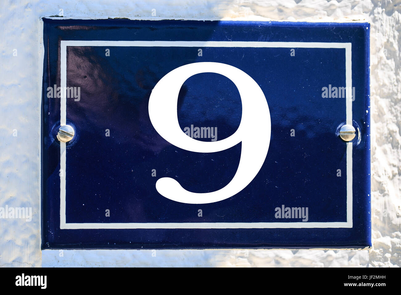 Number of house in blue color Stock Photo - Alamy