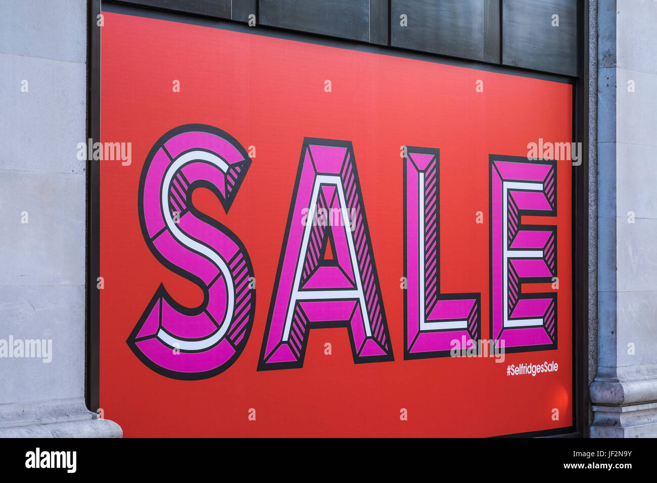 Sale sign in the window of Selfridges on Oxford street, London, England ...