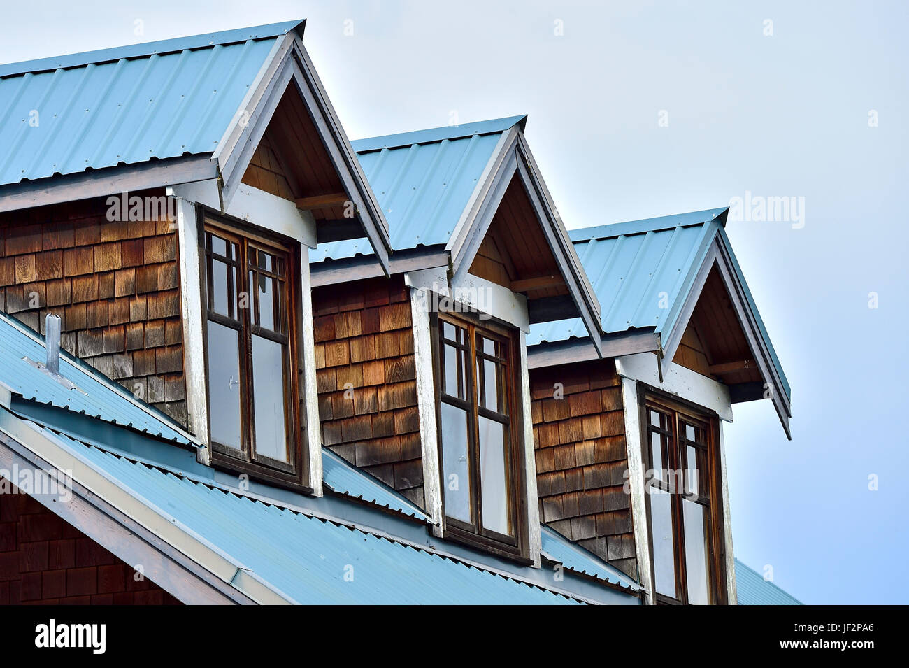 A cottage roof with three extended windows on Vancouver Island British ...
