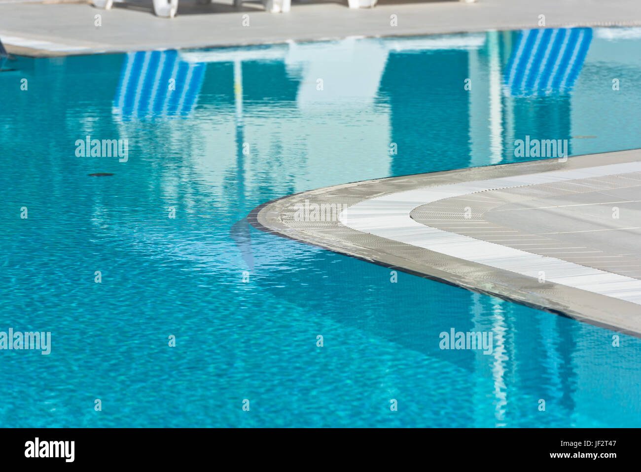 Clear blue bright water in the swimming pool Stock Photo - Alamy