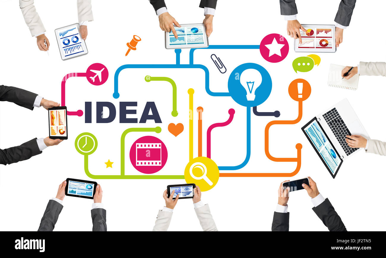 Group of people with devices in hands working together as symbol of ...