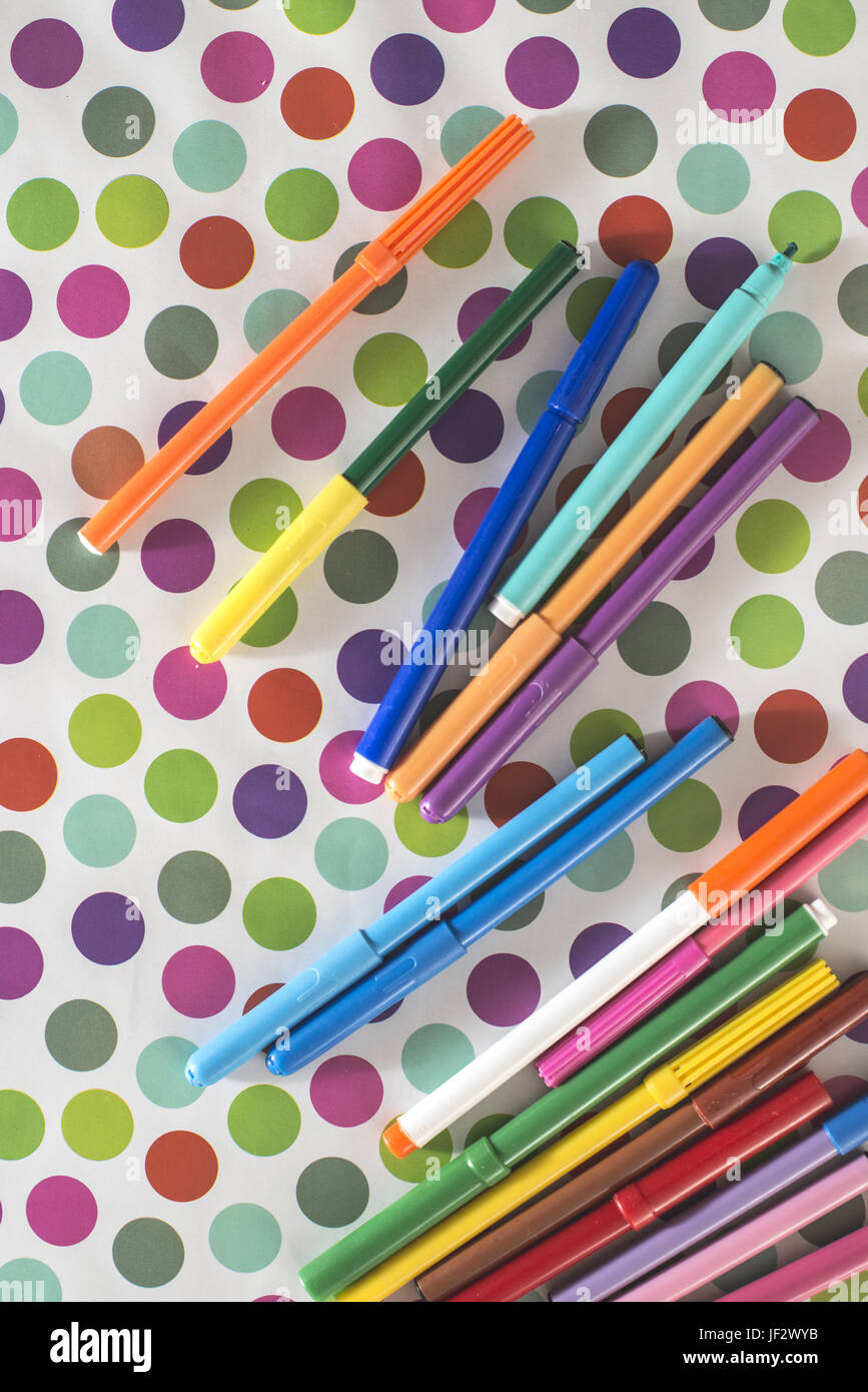 Pens on colorful background Stock Photo - Alamy