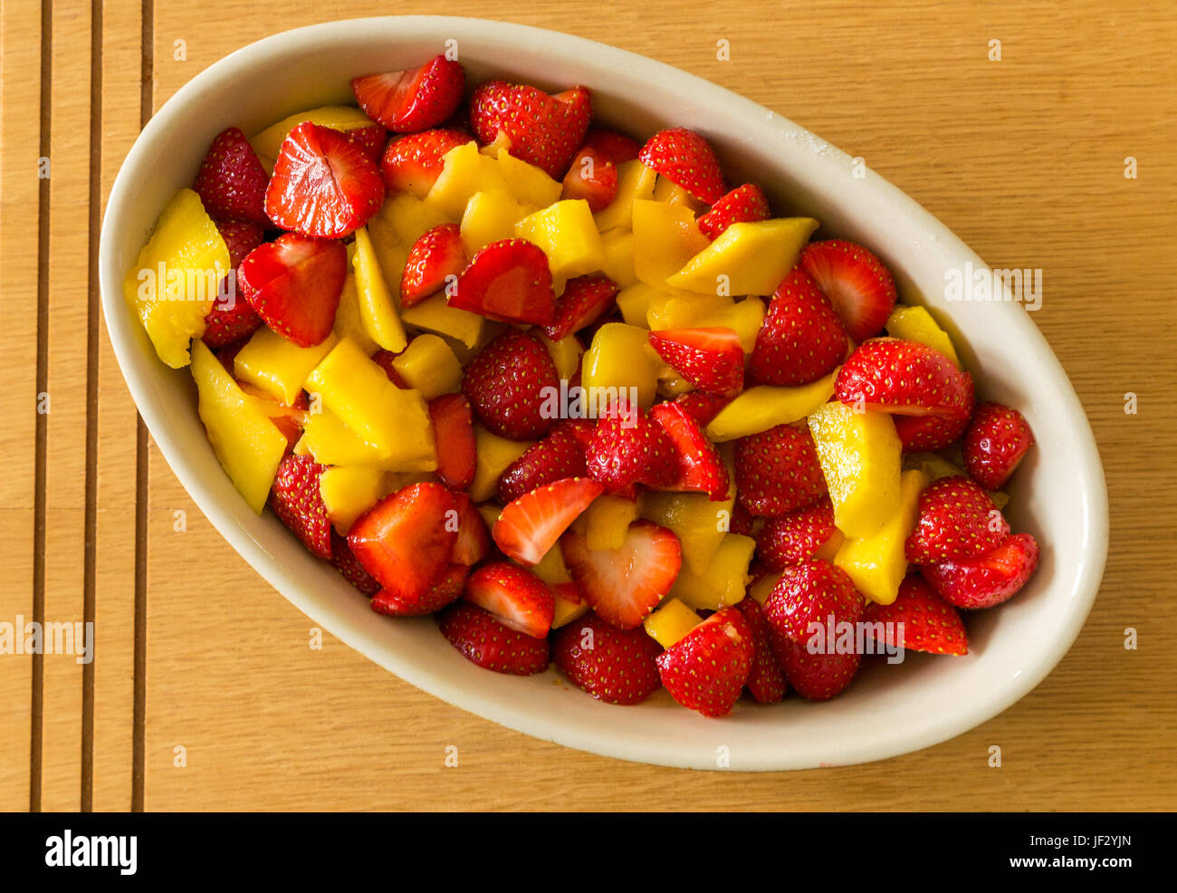 Strawberries And Mango High Resolution Stock Photography and Images - Alamy
