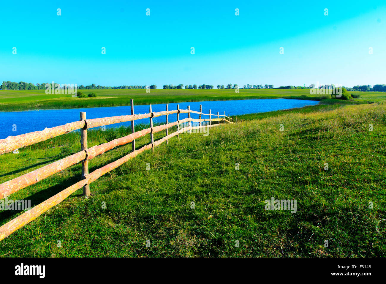 A beautiful lake for breeding fish. Magnificent view of the lake Stock ...