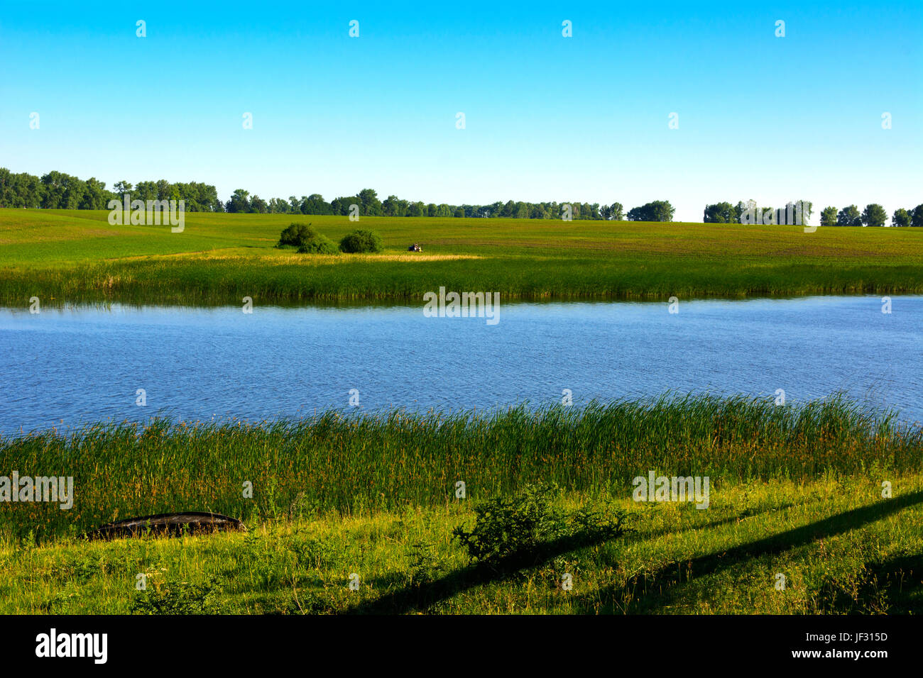A beautiful lake for breeding fish. Magnificent view of the lake Stock ...