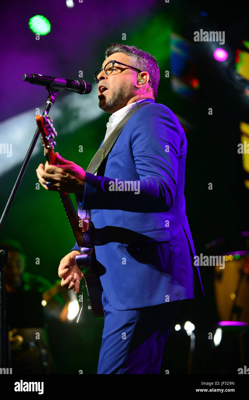 Luis Enrique performing onstage in concert at James L. Knight Center in Miami, Florida ...