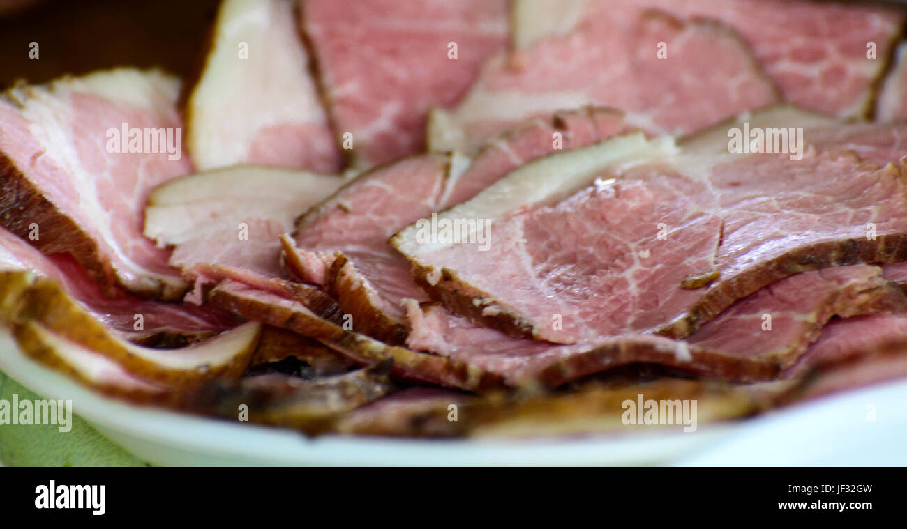 Ham chopped thin slices for a light snack Stock Photo - Alamy