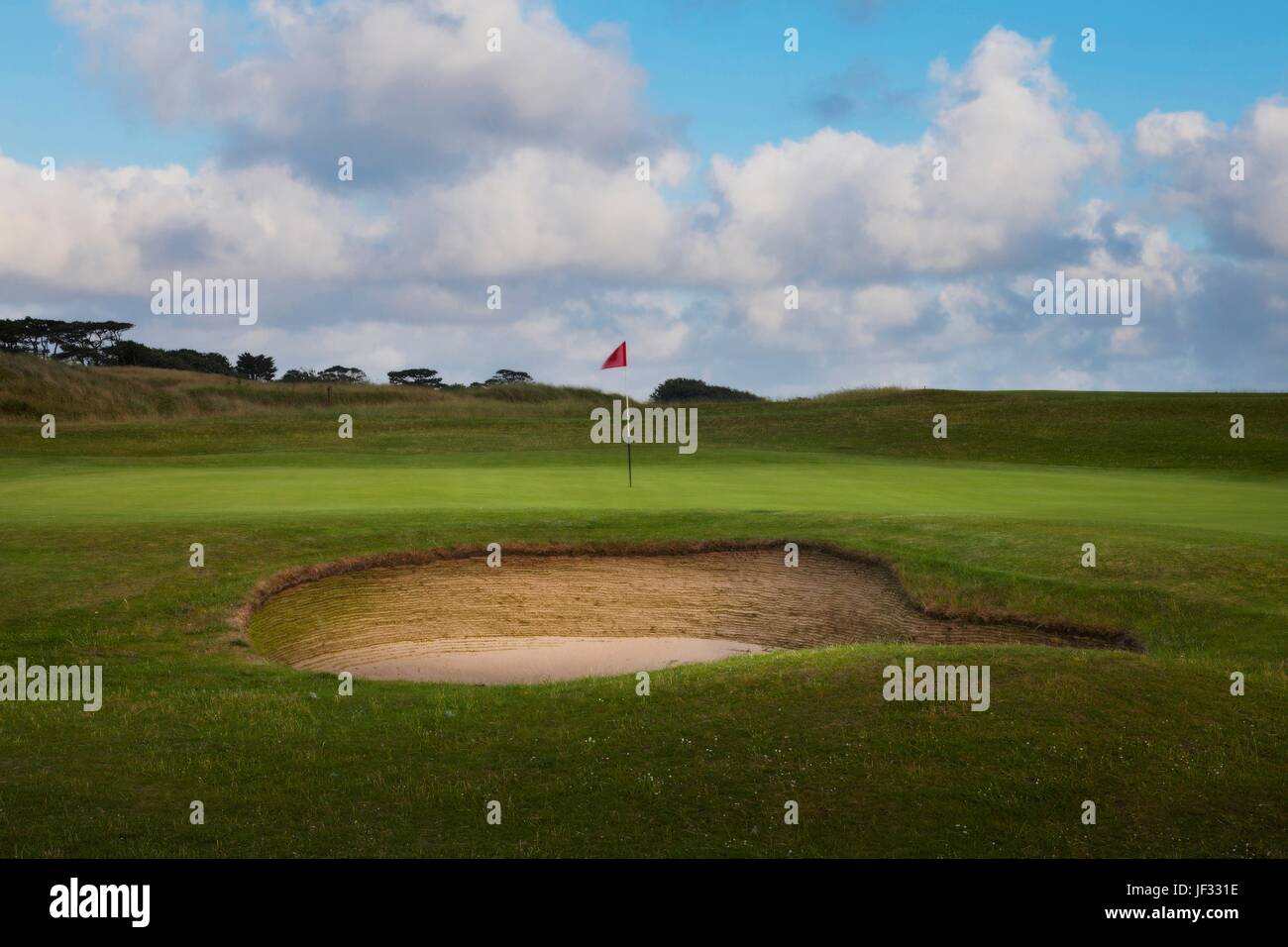 Golf bunker and green Stock Photo - Alamy