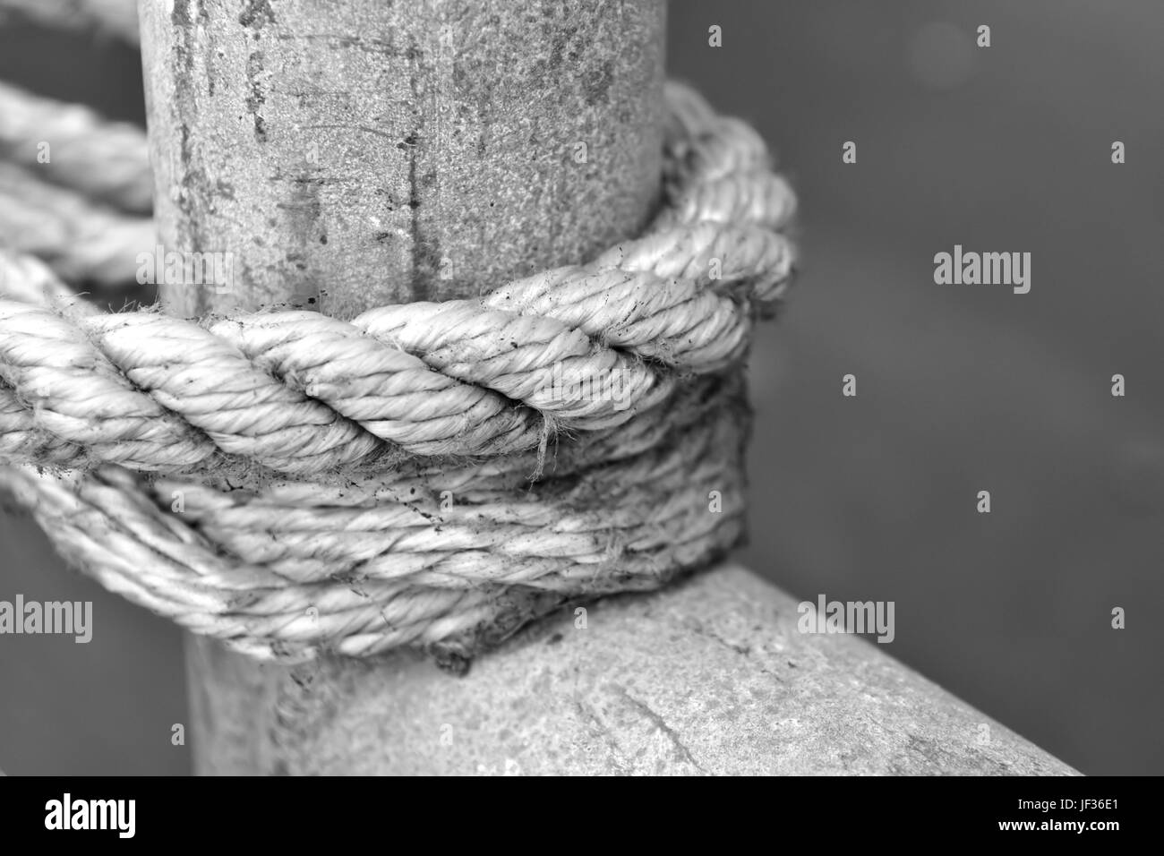 Rope around a pole Black and White Stock Photos & Images - Alamy