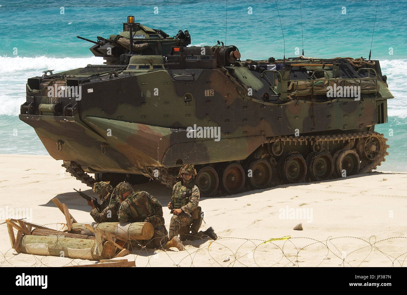 040718-N-5055W-061 U.S. Marines guard their Amphibious Assault Vehicle ...