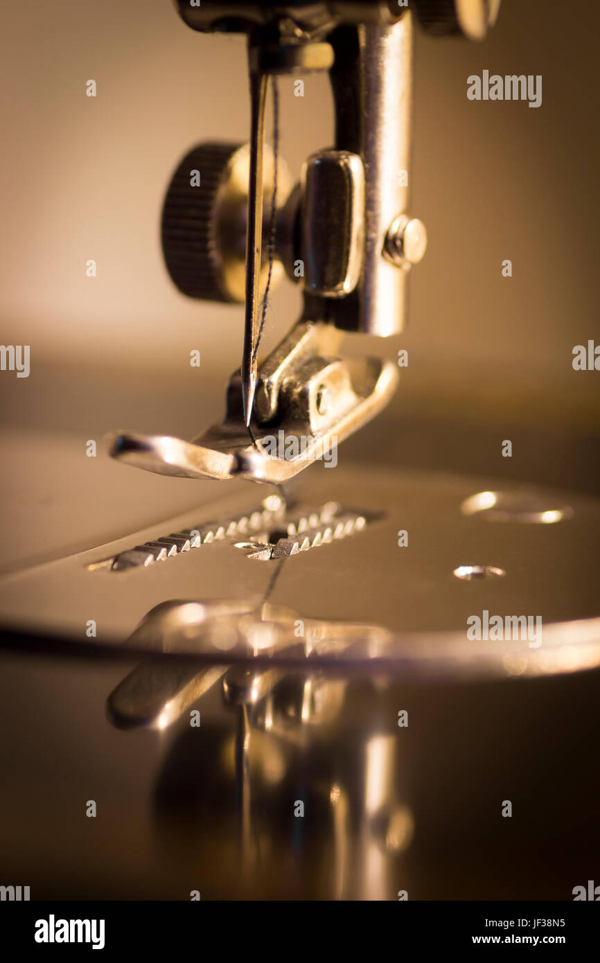 The needle of the sewing machine close-up Stock Photo - Alamy
