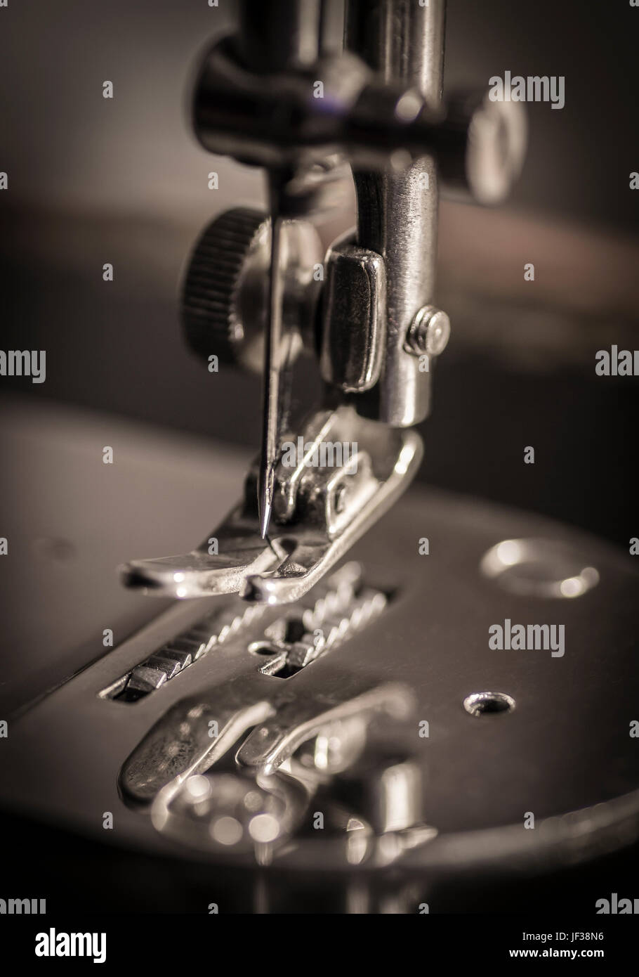 The needle of the sewing machine close-up Stock Photo - Alamy