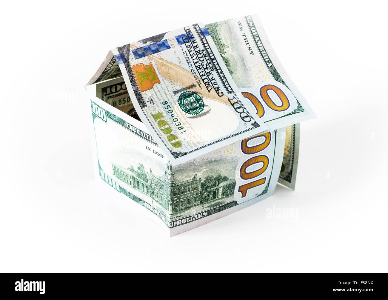 House of paper money close up on white background Stock Photo - Alamy