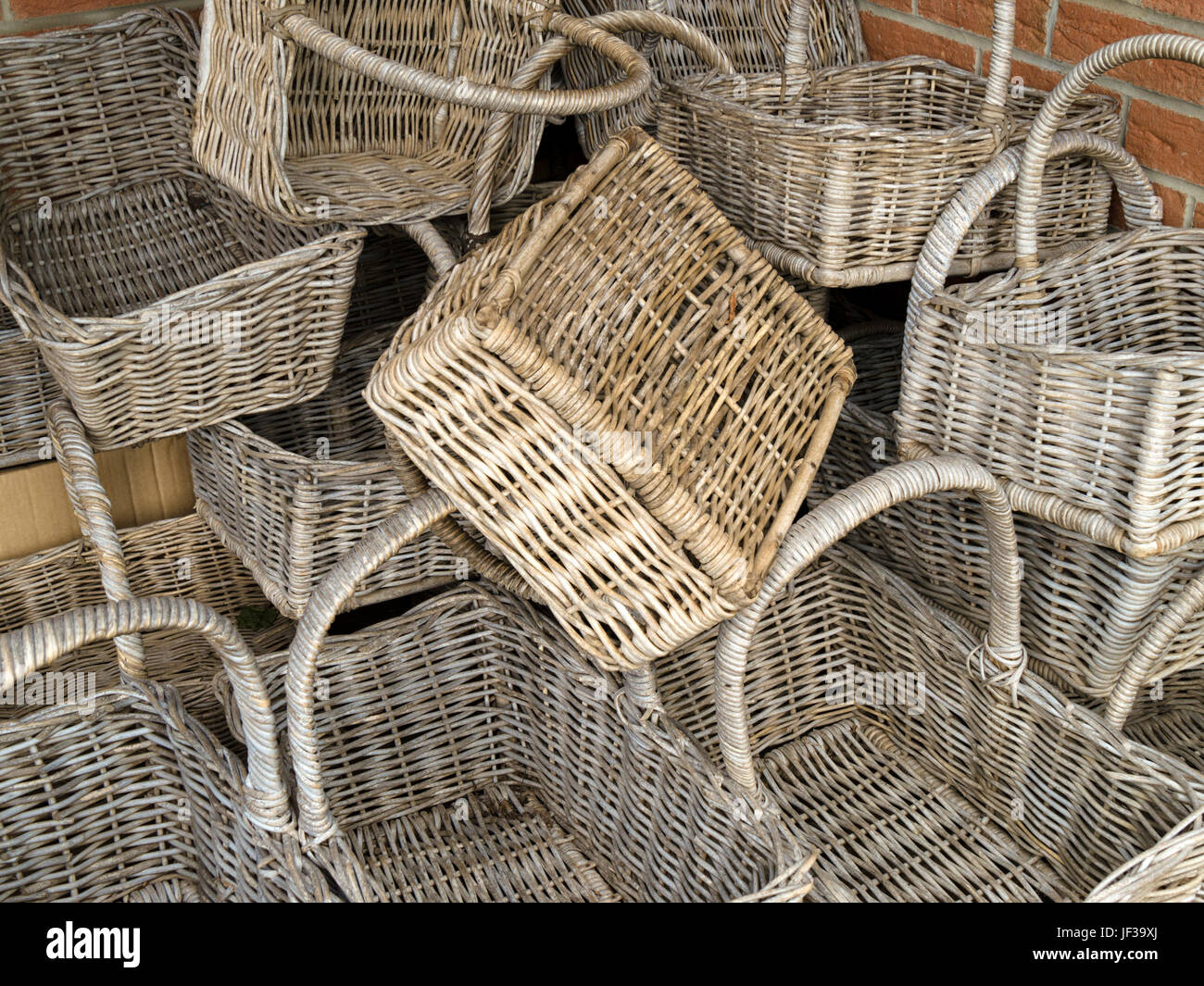 Pile of wicker shopping baskets Stock Photo - Alamy